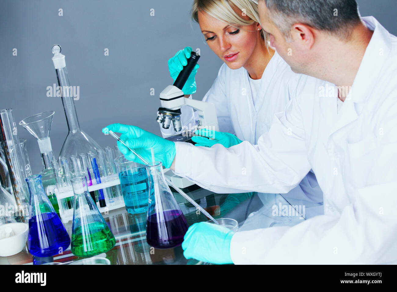 Chemistry Scientist conducting experiments in laboratory Stock Photo ...