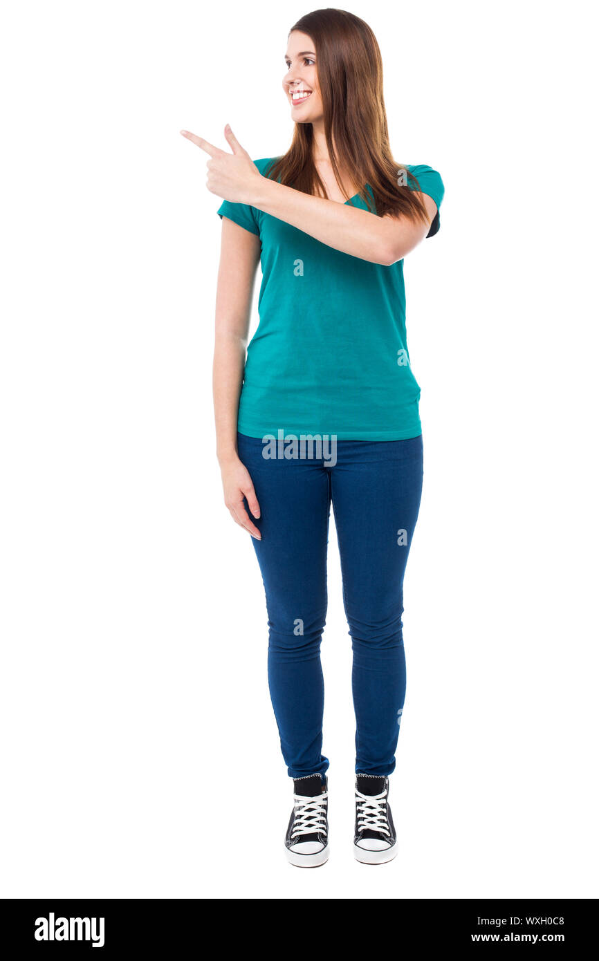 Pretty girl pointing something out Stock Photo - Alamy