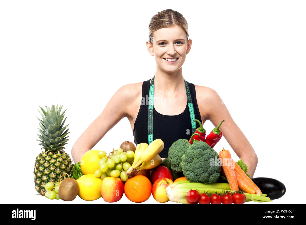 Female nutrition expert with fruits and vegetables Stock Photo - Alamy
