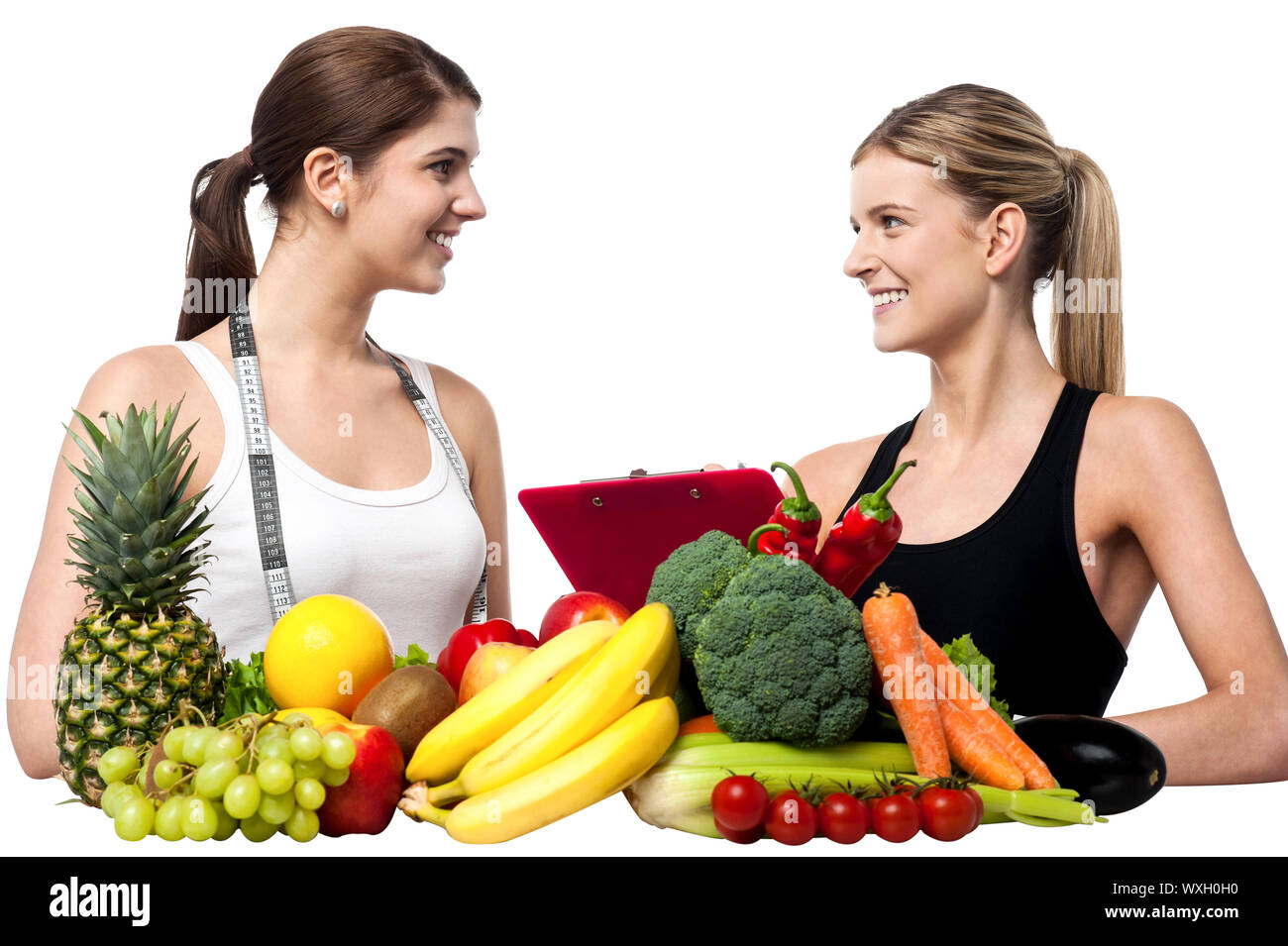 Female nutrition experts isolated on white Stock Photo - Alamy