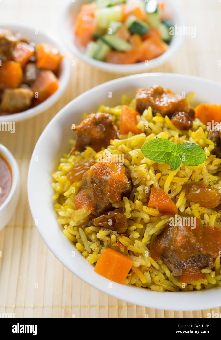 Arab rice, rice with meat and carrot in a bowl. Middle eastern food ...