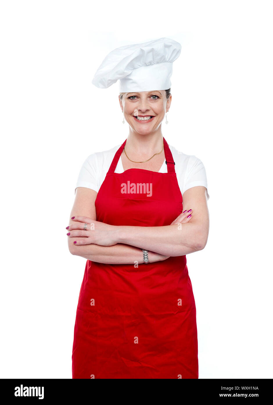 Pretty baker woman posing confidently Stock Photo - Alamy