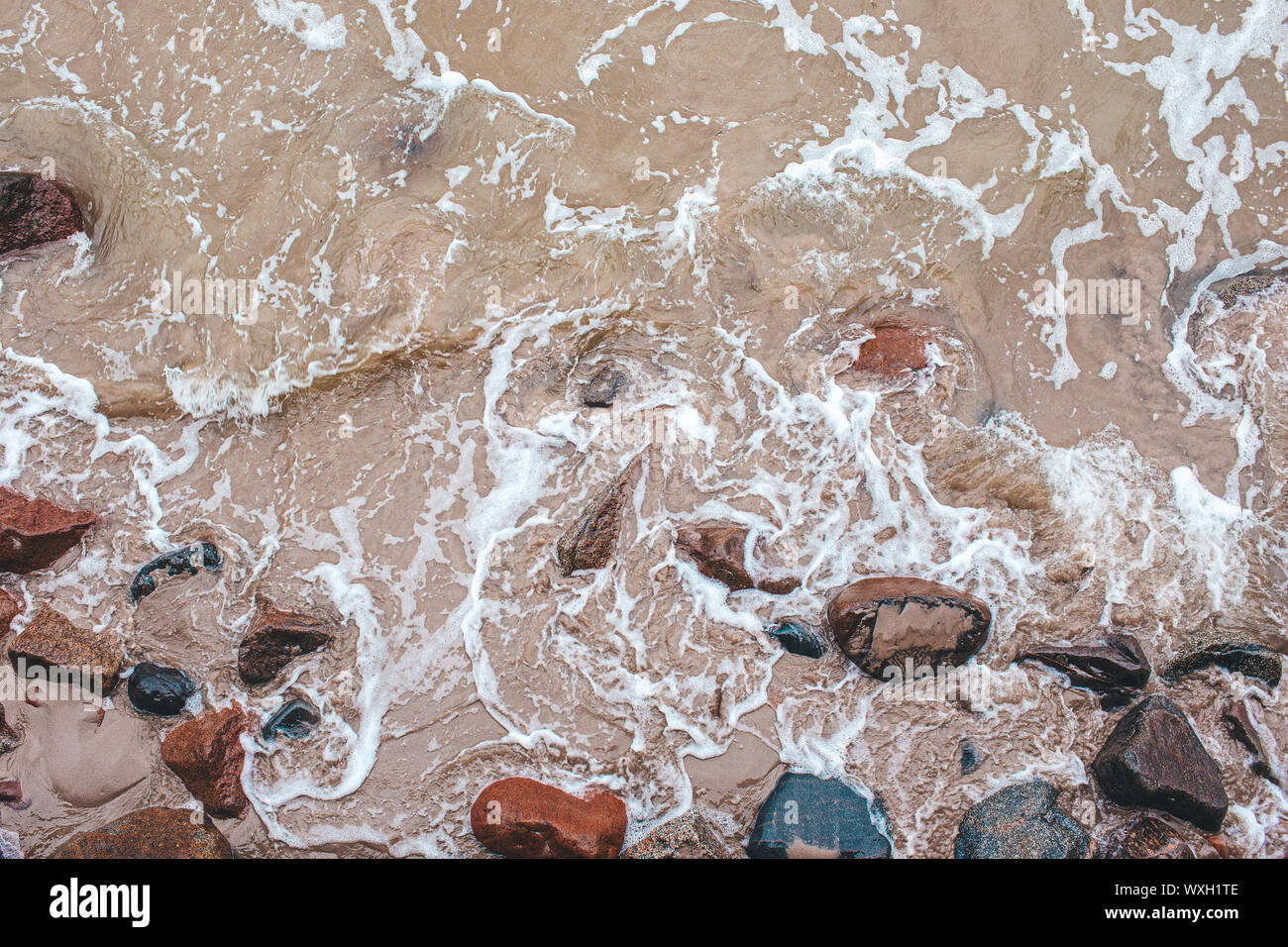 Aerial view of crashing waves on stones View from above, beautiful ...