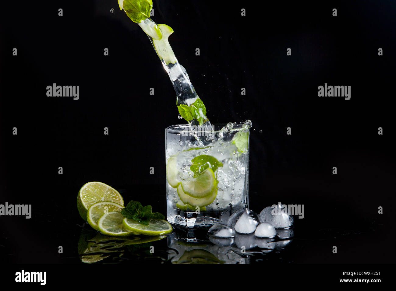 Mojito summer beach refreshing tropical cocktail in glass with splash ...