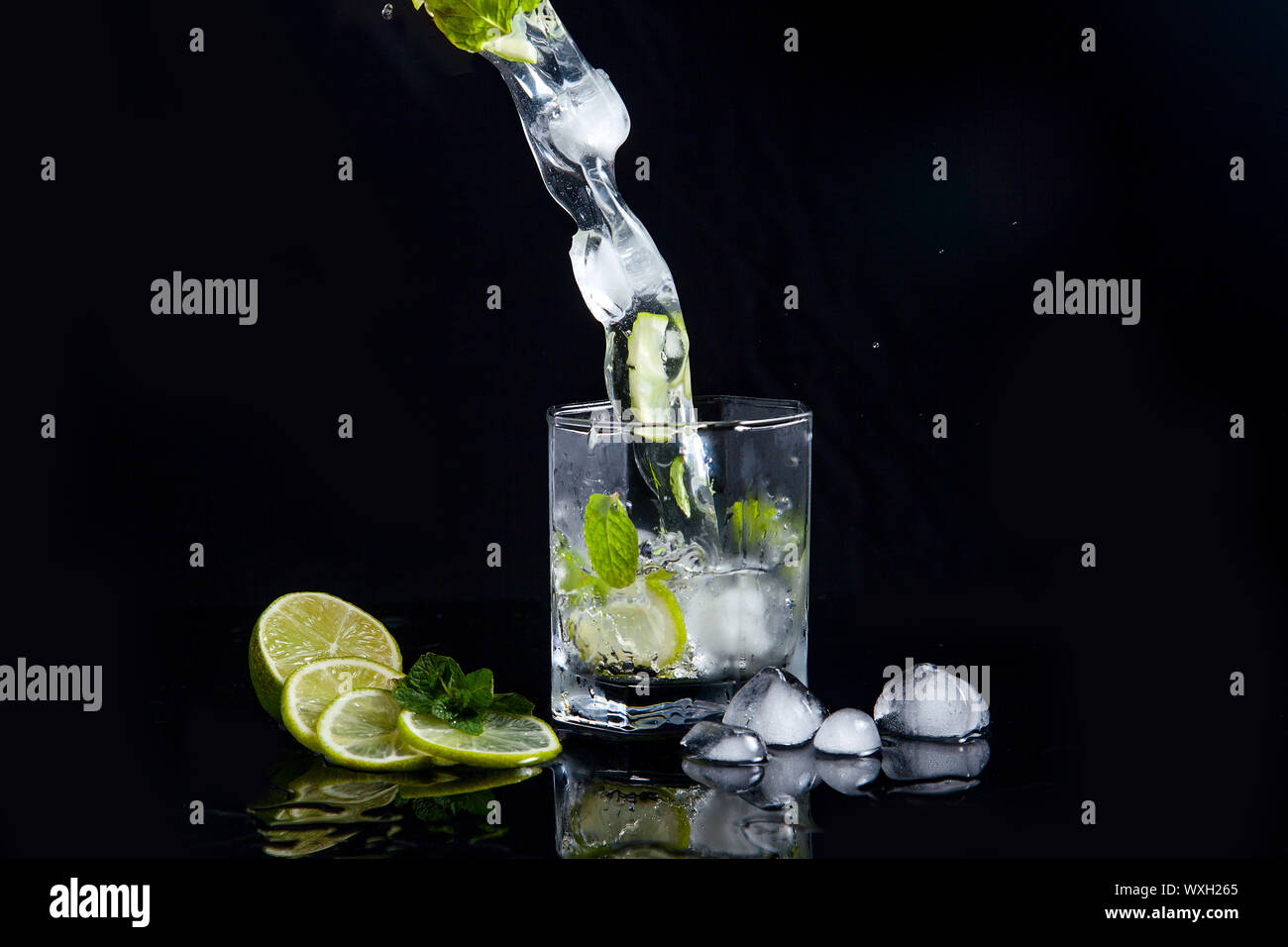 Mojito summer beach refreshing tropical cocktail in glass with splash ...