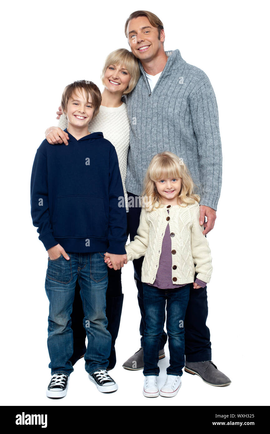 Young parents with children isolated over white Stock Photo - Alamy