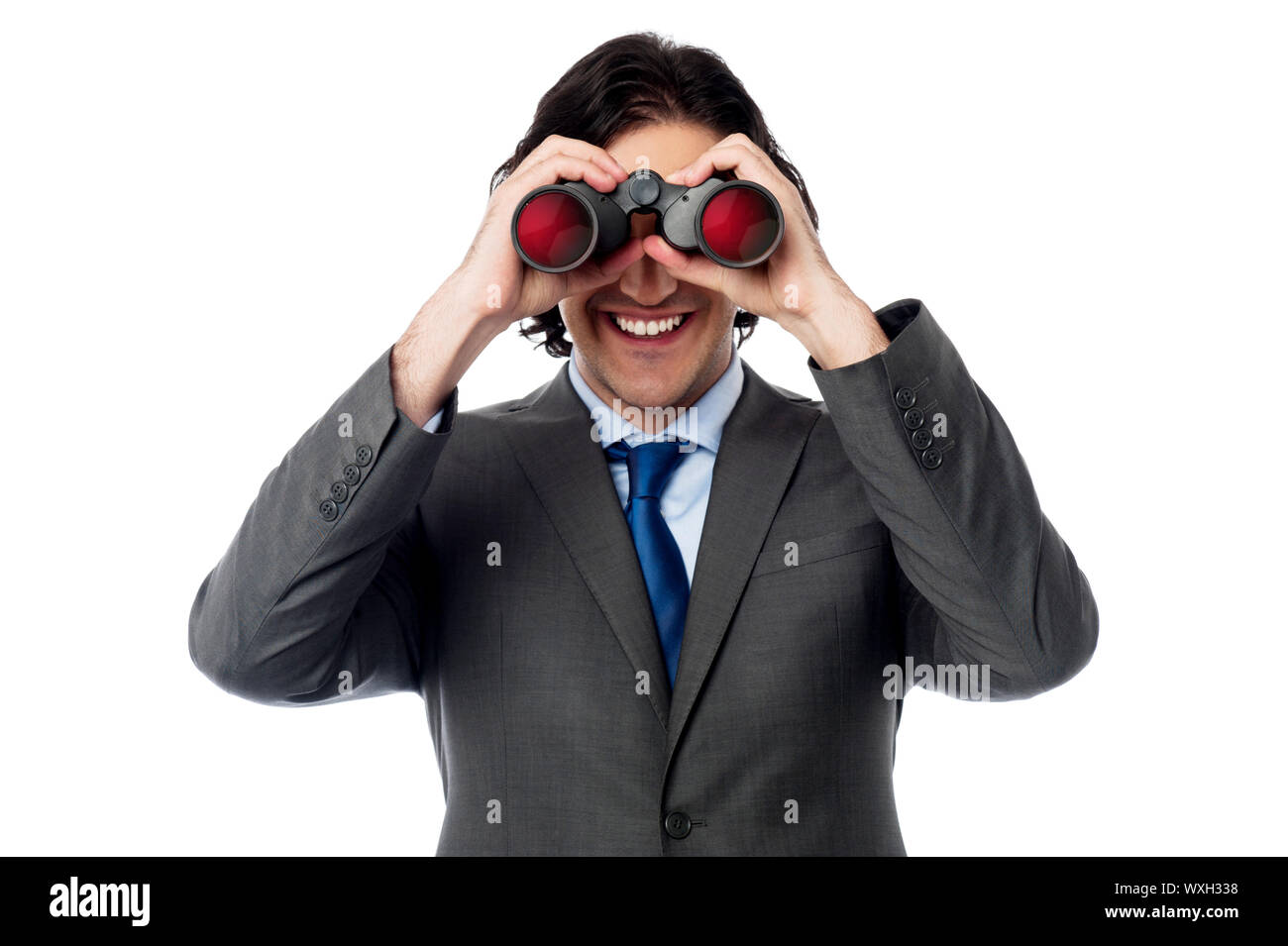 Corporate man viewing through binoculars Stock Photo - Alamy
