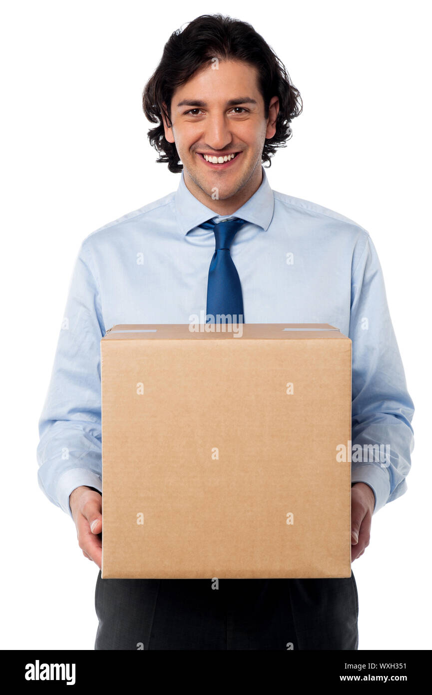 Young professional carrying heavy carton Stock Photo - Alamy