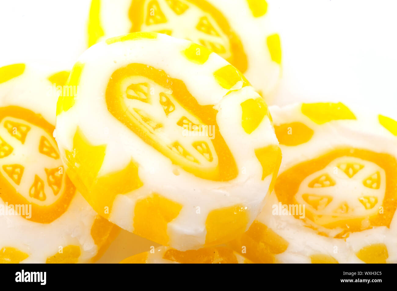 Many old fashioned sweets in citrus taste Stock Photo - Alamy