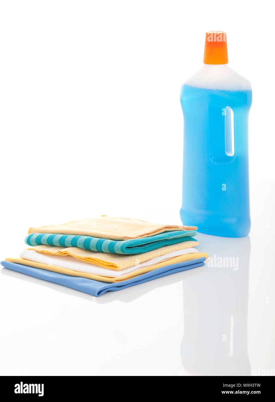 cleaning dusters with bottle cleaning liquid on white Stock Photo - Alamy