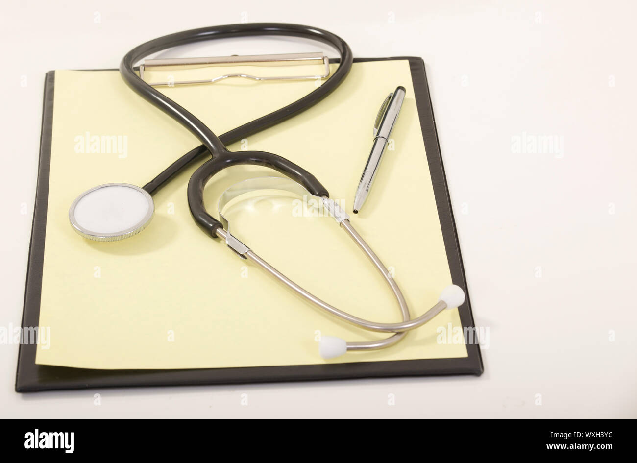 Medical Stethoscope with Pen on Medical File Folders Stock Photo - Alamy