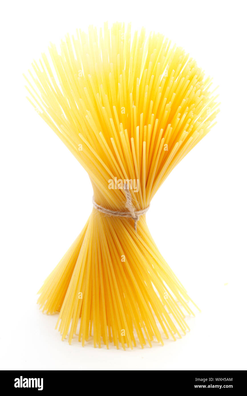 Dry spaghetti isolated on white background Stock Photo - Alamy