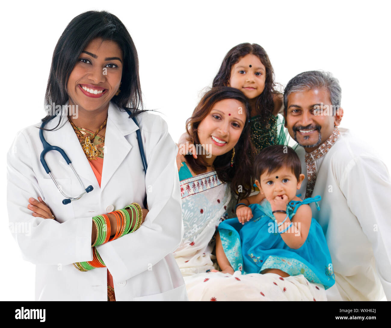 Smiling friendly Indian female medical doctor and patient family ...