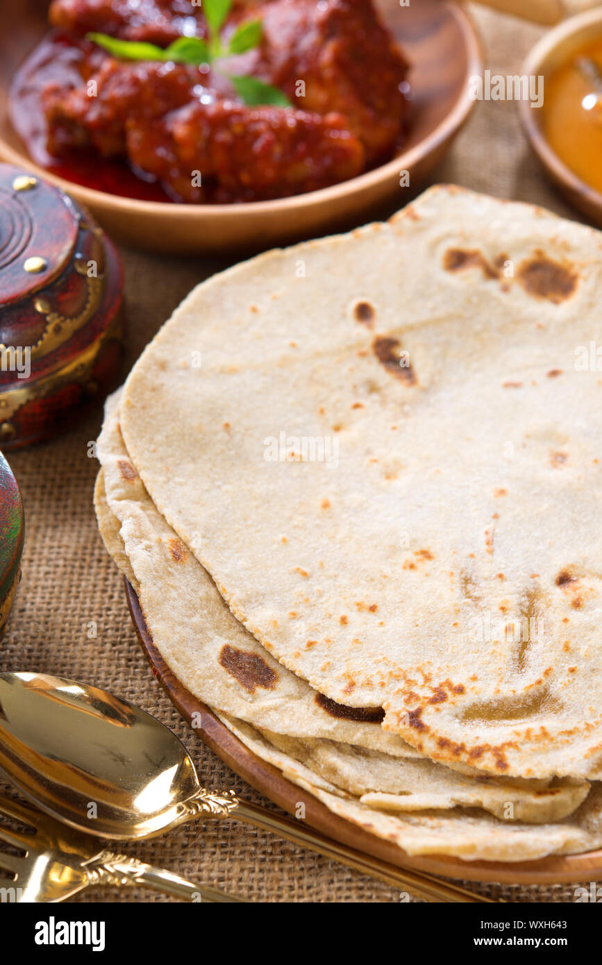 Chapati or Flat bread, Indian chapatti, dhal and chicken curry, popular ...