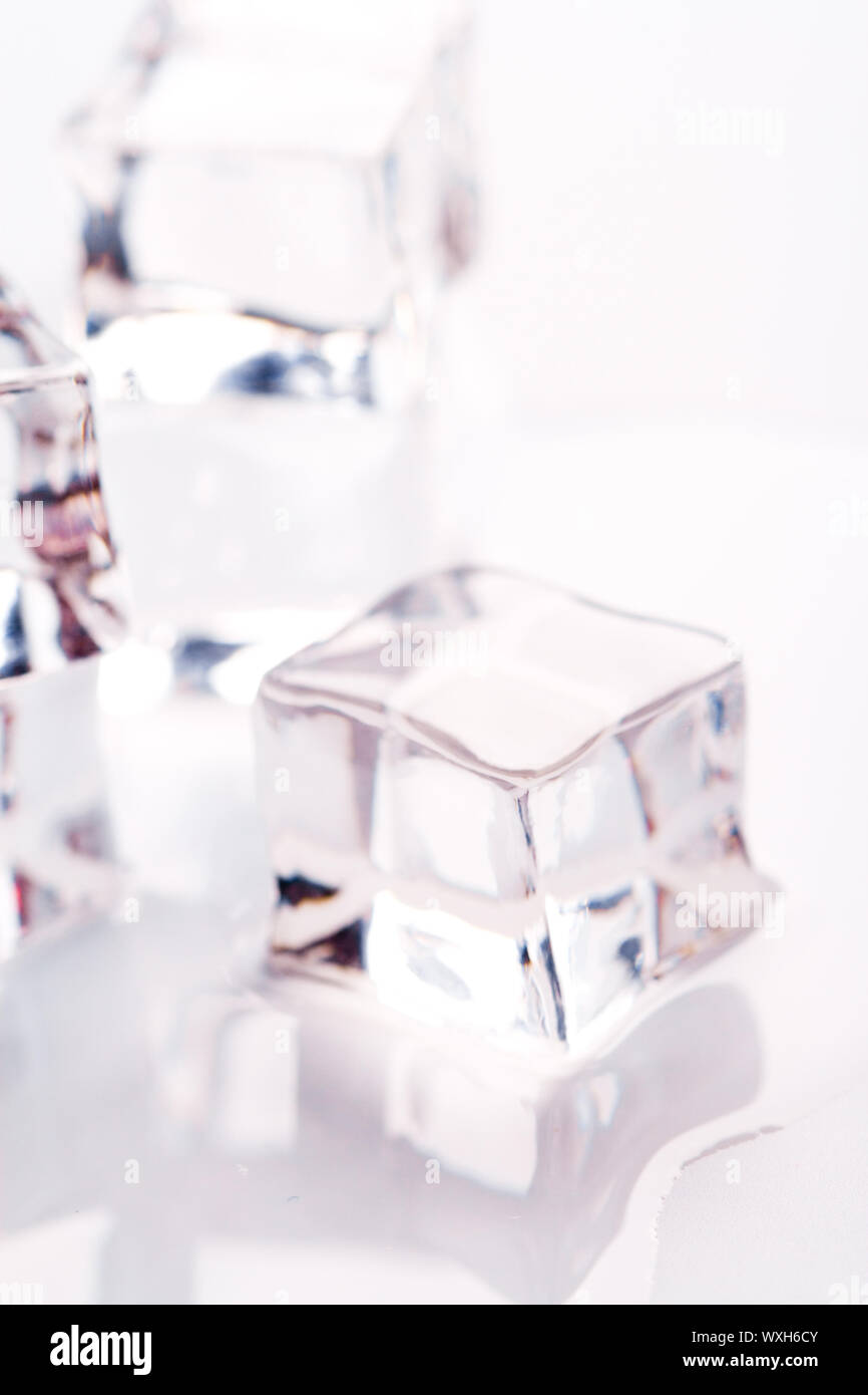 stack of ice cubes on white background Stock Photo - Alamy