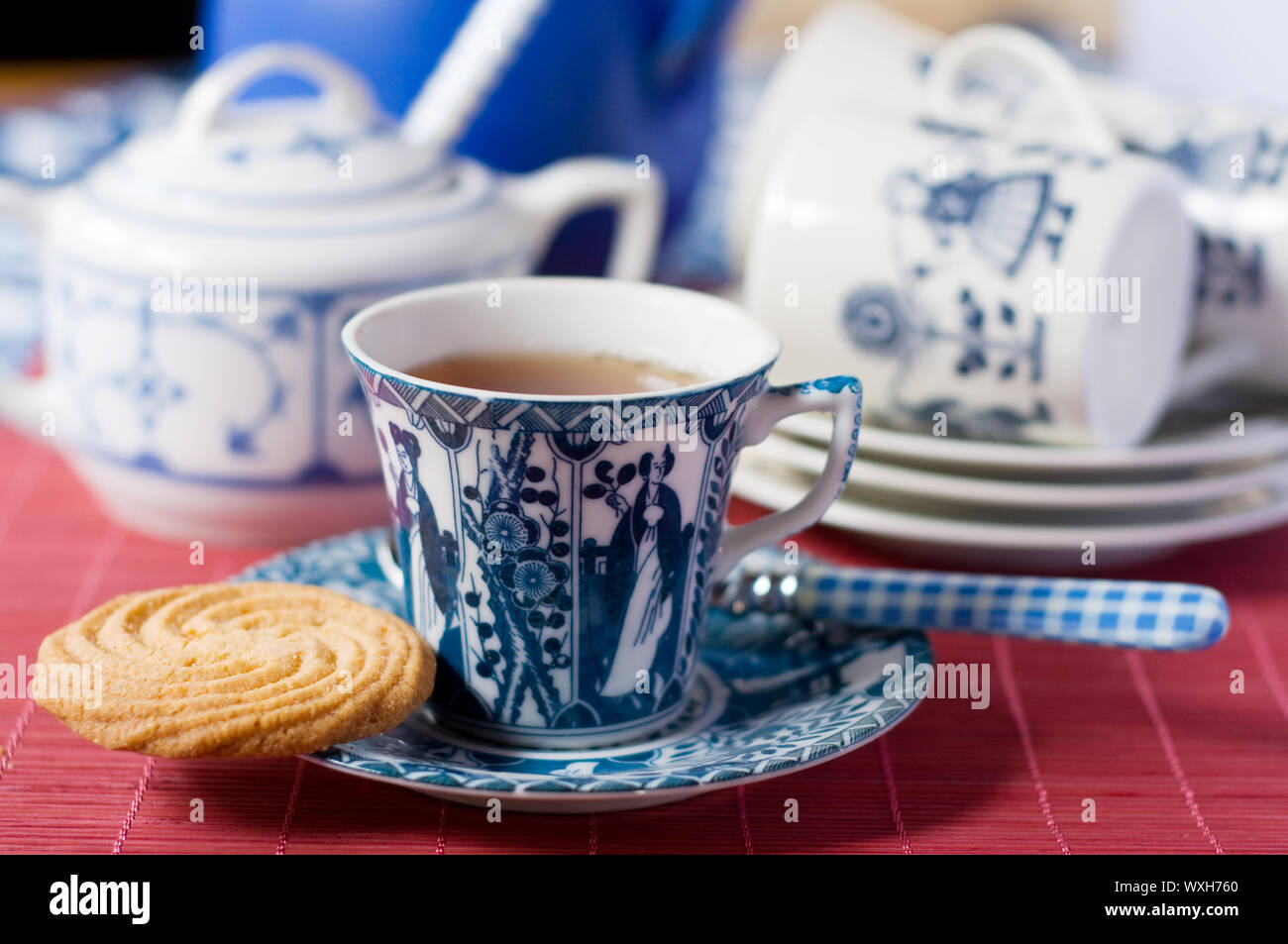 Dutch cup of tea in vintage crockery with cookie Stock Photo - Alamy
