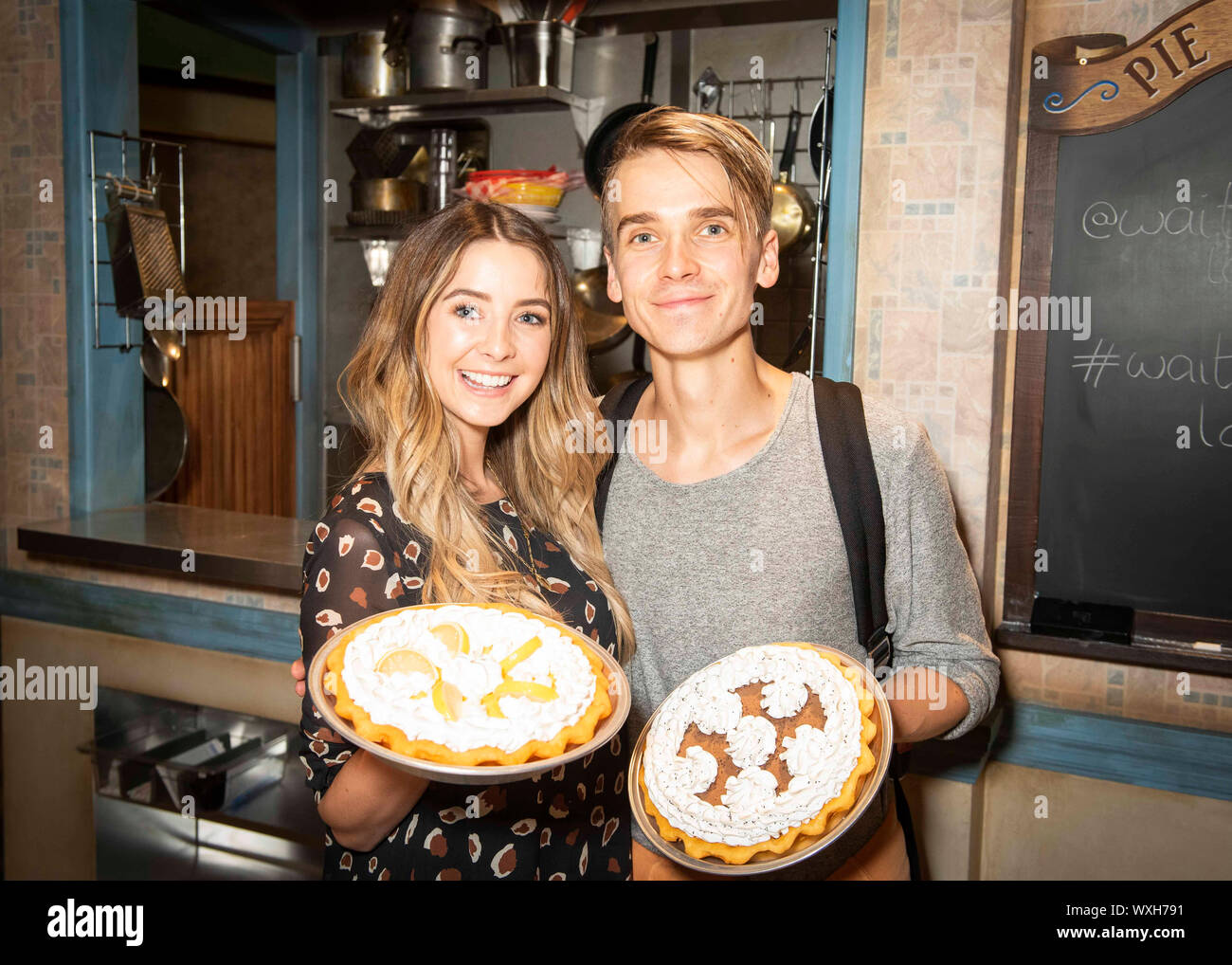 Zoella joins Joe Sugg on stage to celebrate his first night in the cast ...