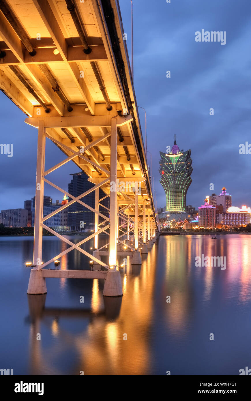Bridge and skyscraper in night, famous landmark in Macao, China Stock ...