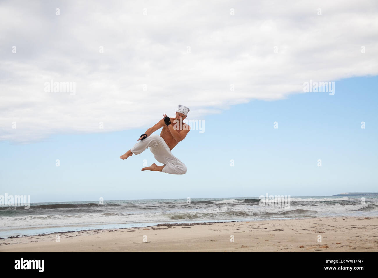 Karate jump kick hi-res stock photography and images - Alamy