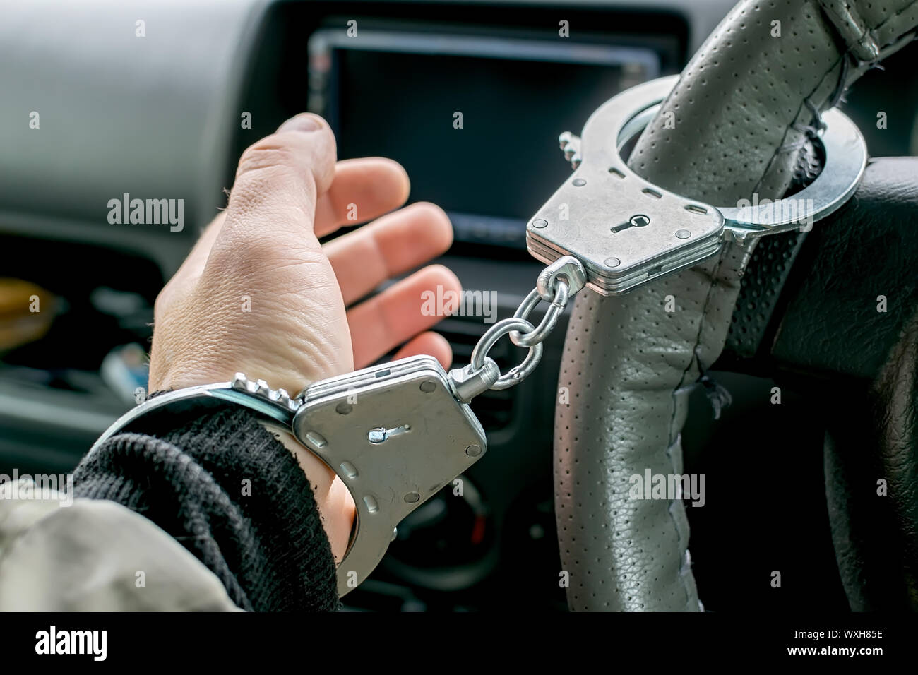 Handcuffed Stock Photos & Handcuffed Stock Images - Alamy