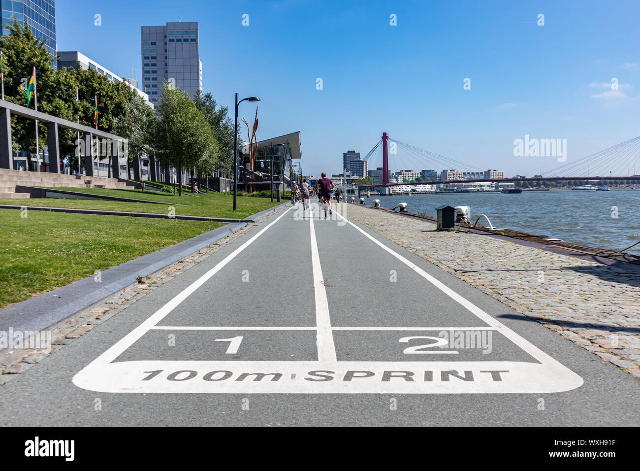 Rotterdam, Netherlands. June 28, 2019. Athletes riding bicycles in a ...