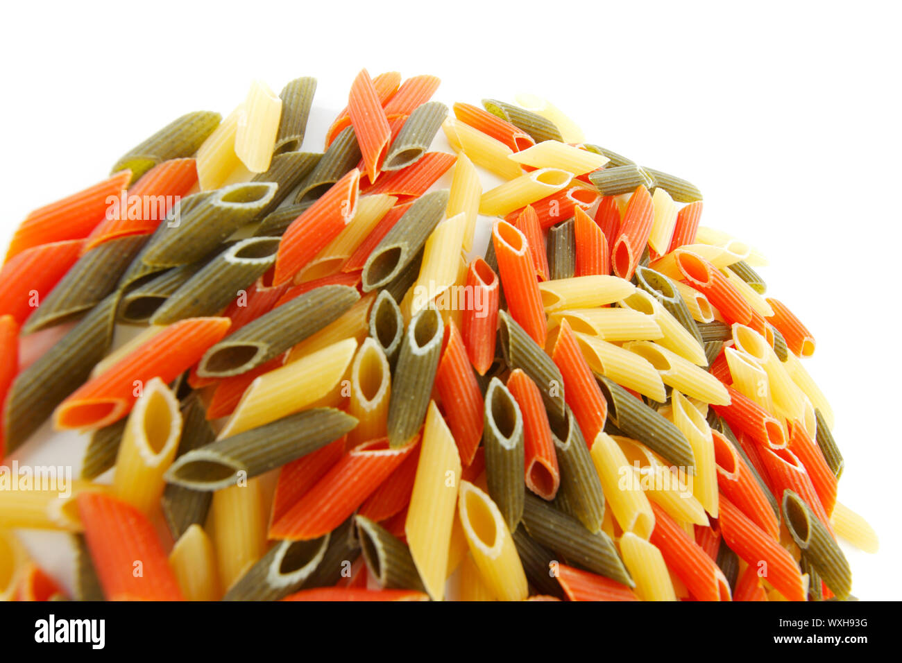 Colored pasta isolated on white background Stock Photo - Alamy