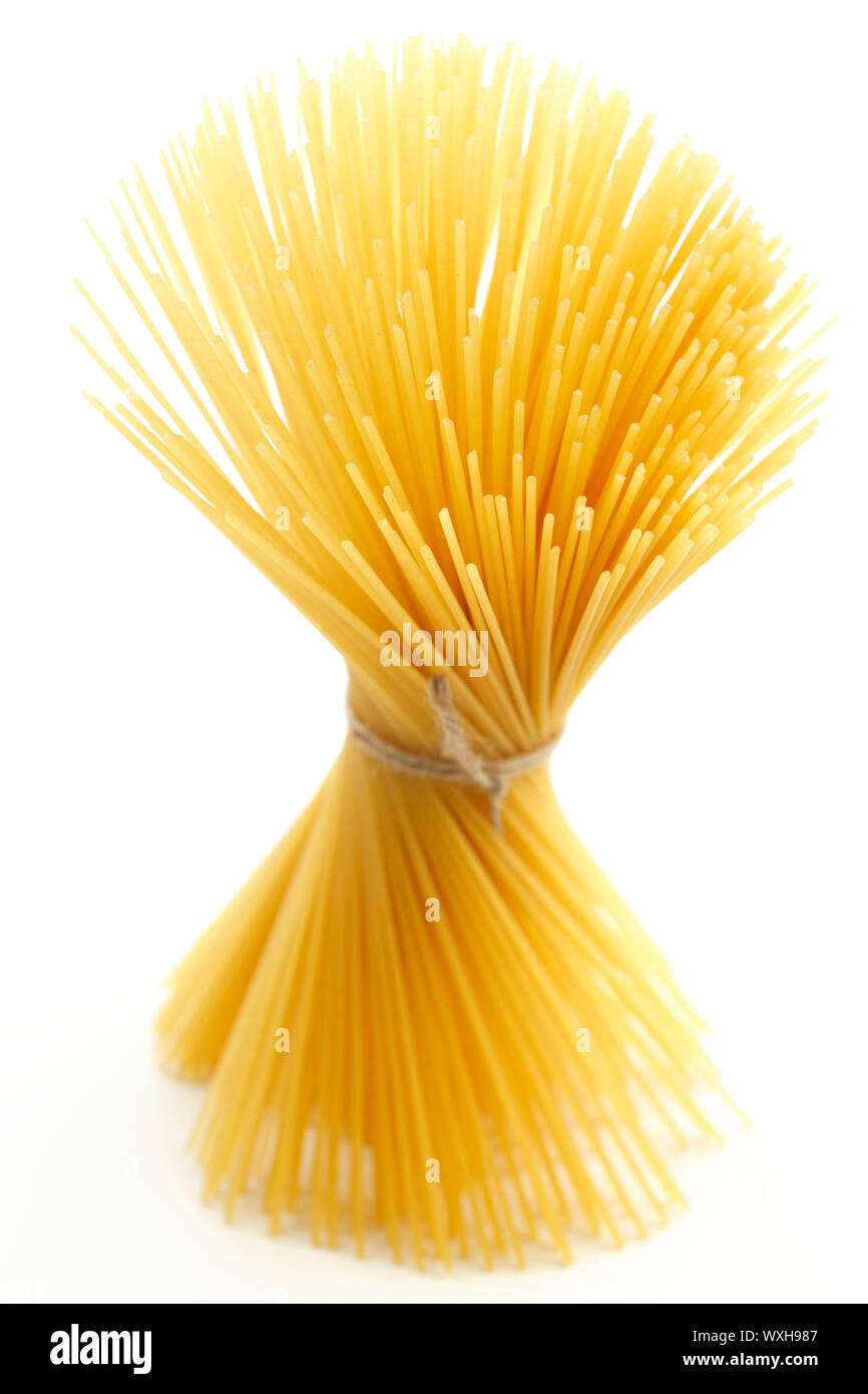 Dry spaghetti isolated on white background Stock Photo - Alamy