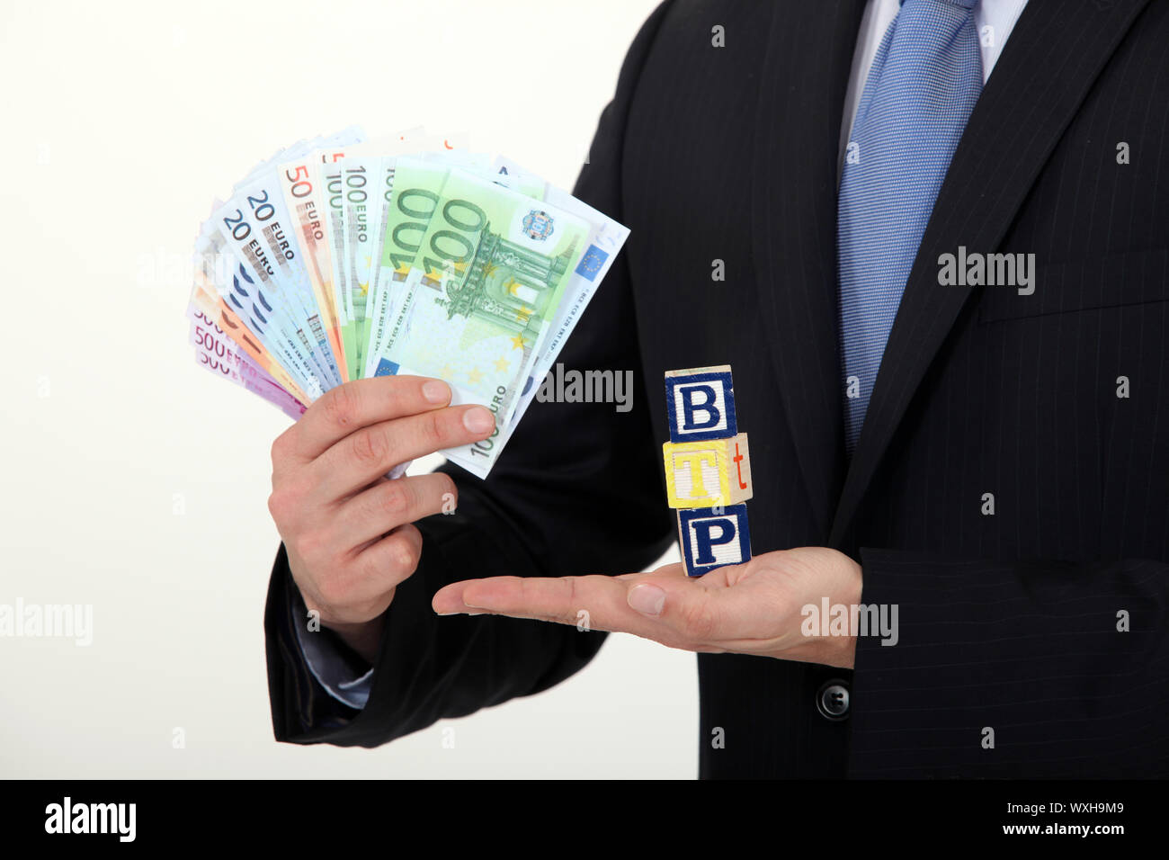 successful businessman holding money Stock Photo - Alamy