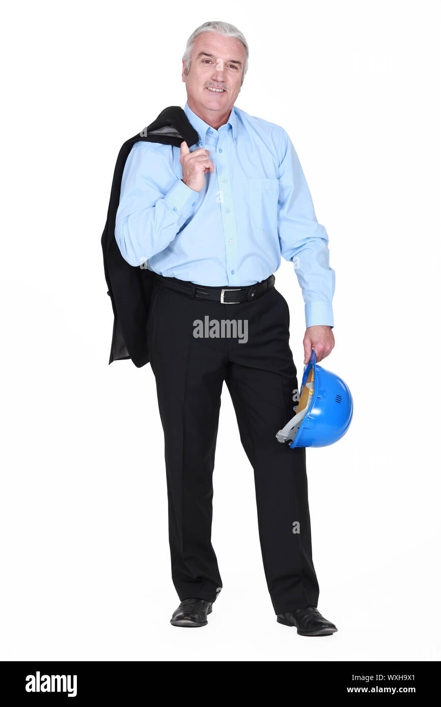 Man holding jacket over shoulder Stock Photo - Alamy