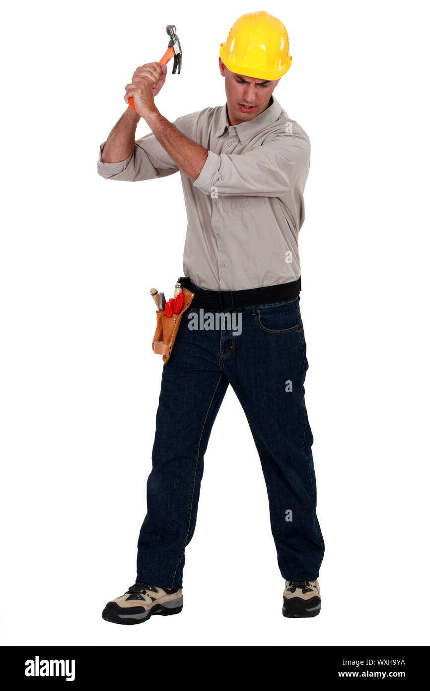 Craftsman with a hammer Stock Photo - Alamy