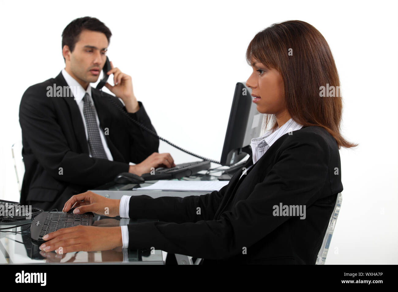 Dynamic business duo Stock Photo - Alamy