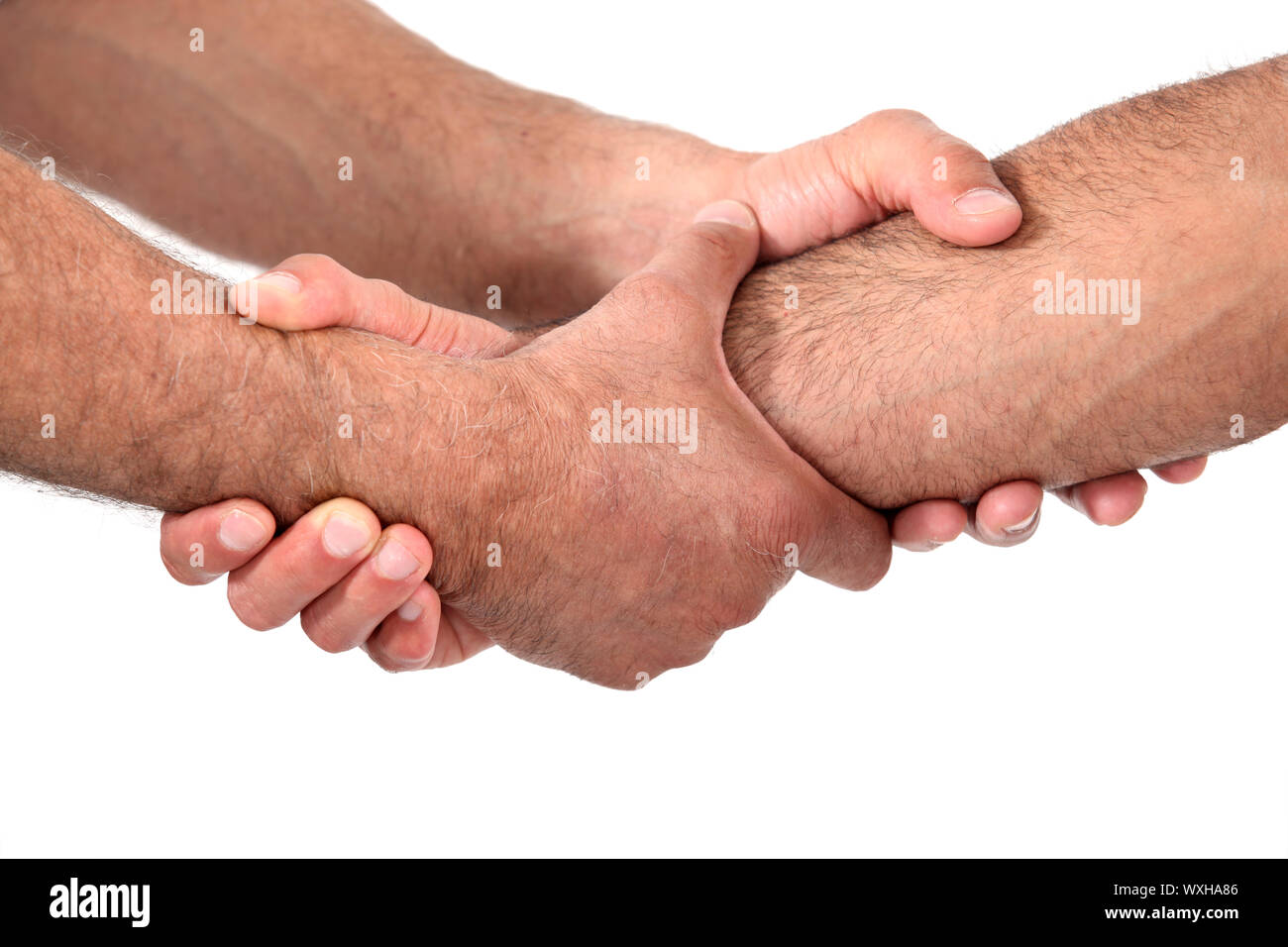 Double clasped handshake Stock Photo - Alamy