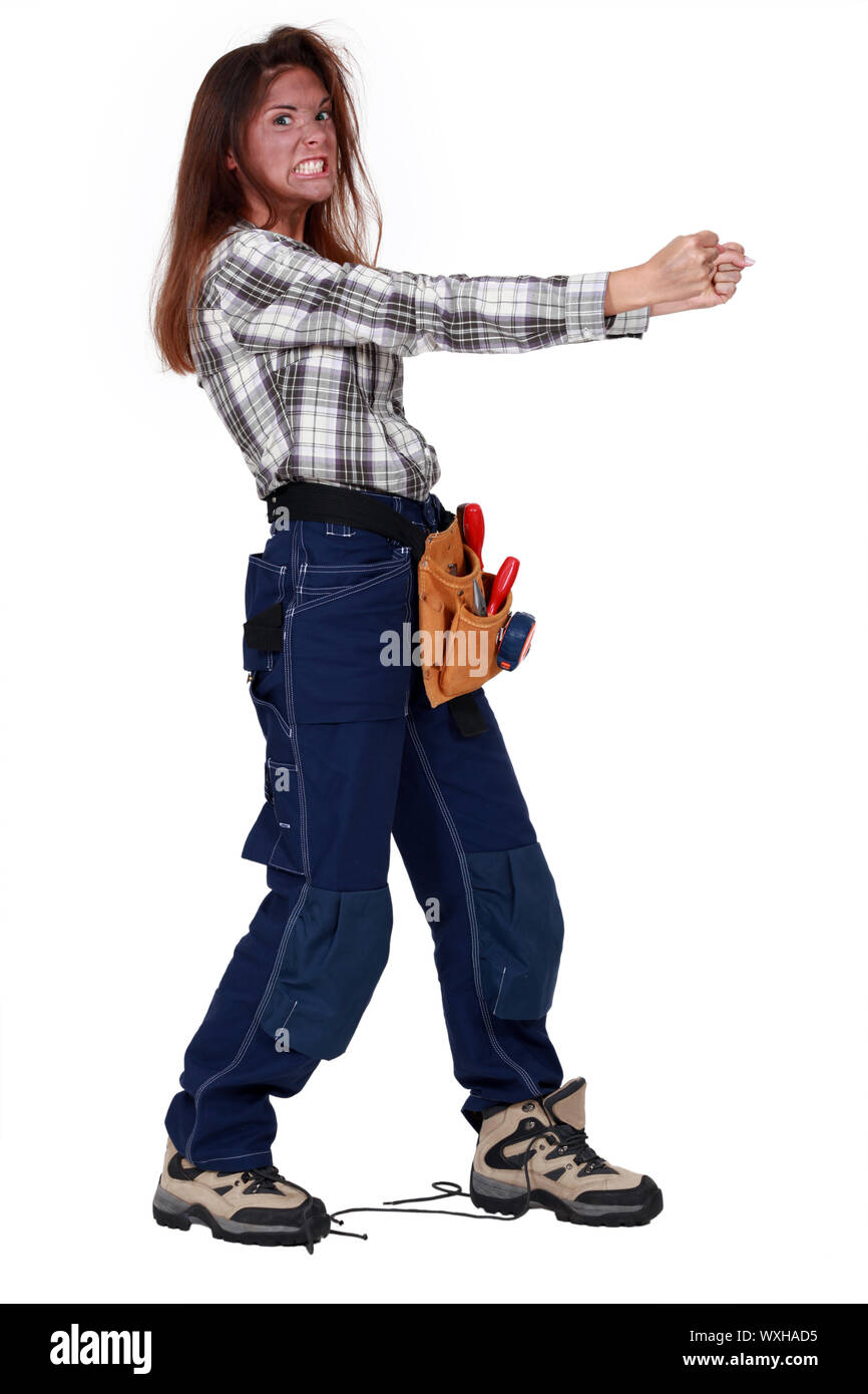 Furious female worker Stock Photo - Alamy