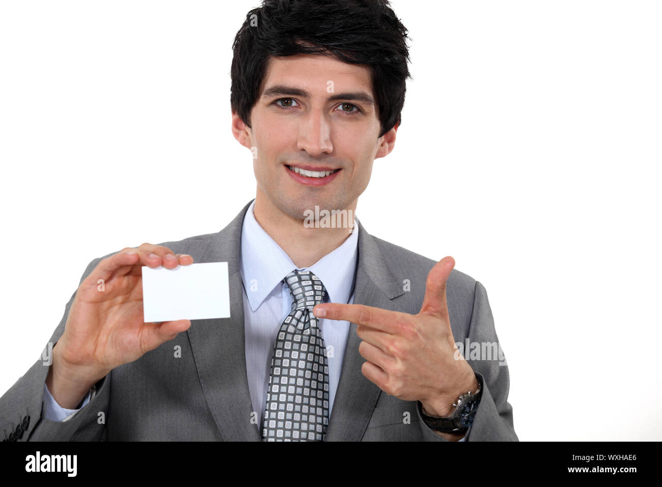 A businessman showing his card Stock Photo - Alamy