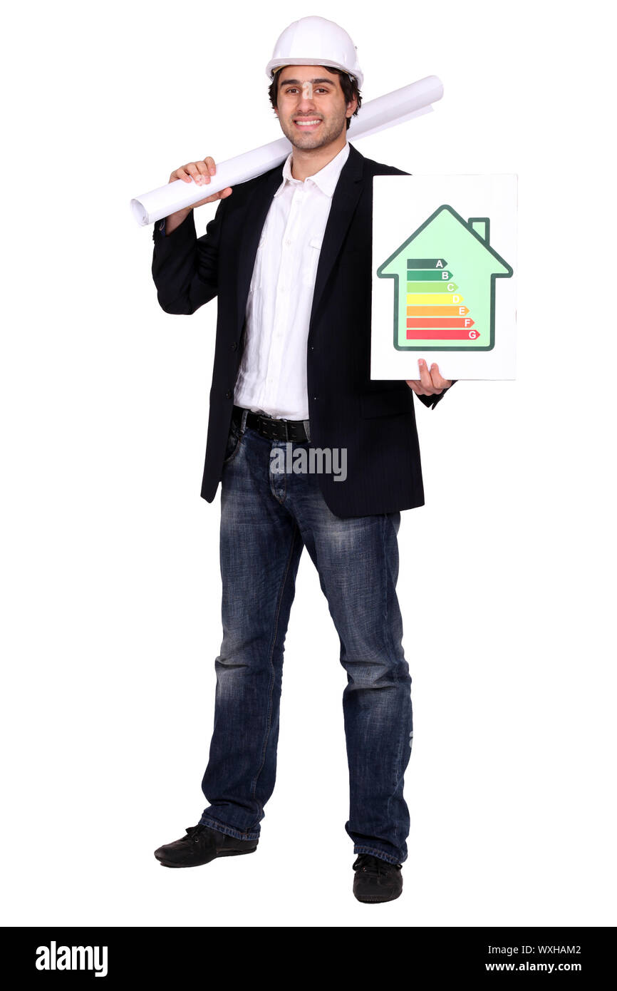Architect stood with energy rating poster Stock Photo - Alamy
