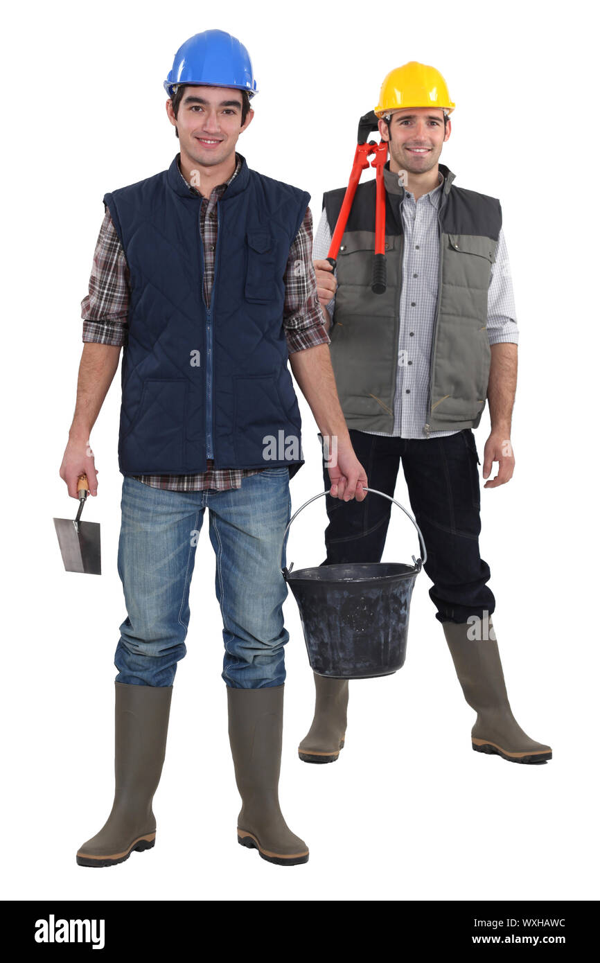Two constructions workers stood together Stock Photo - Alamy