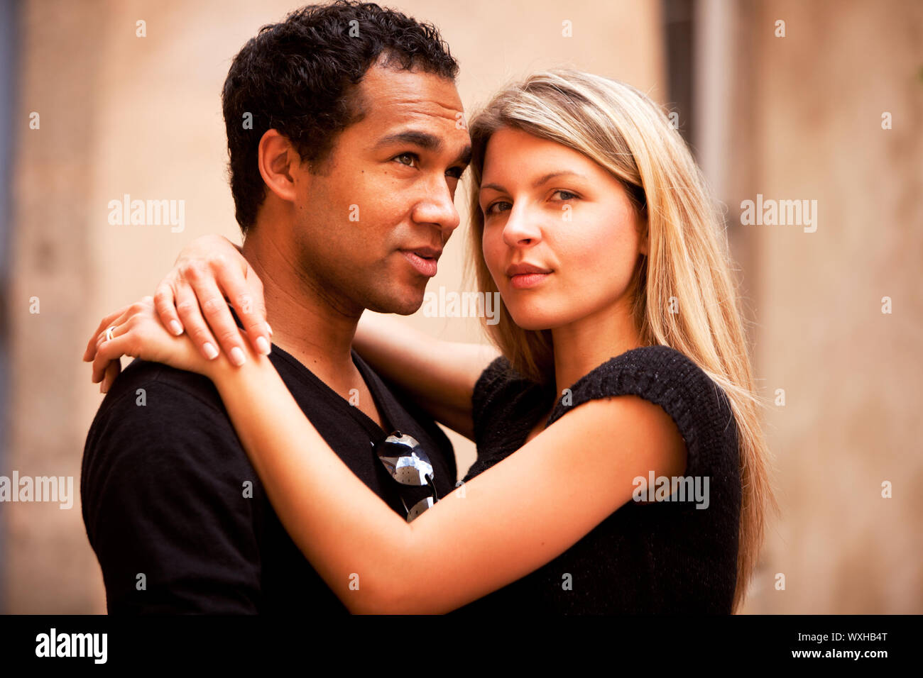 An attractive french couple in an outdoor urban setting Stock Photo - Alamy