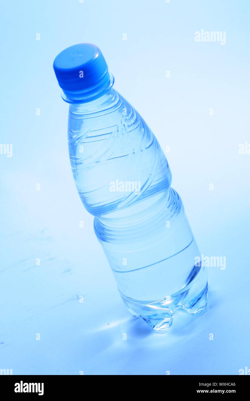 clear cold blue water in bottle Stock Photo - Alamy