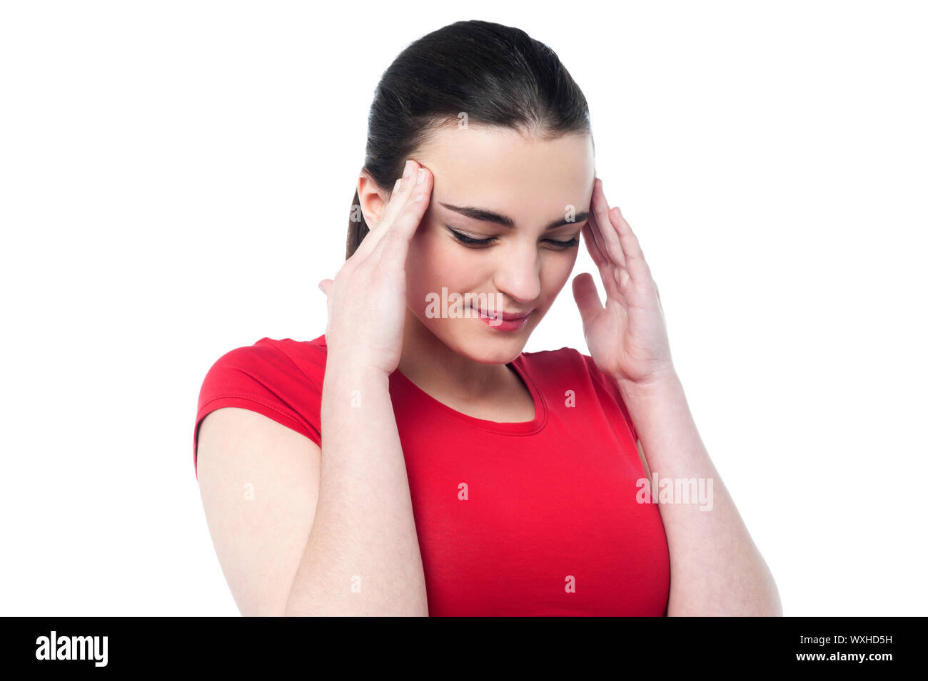 Girl applying gentle pressure on her forehead during headache Stock ...