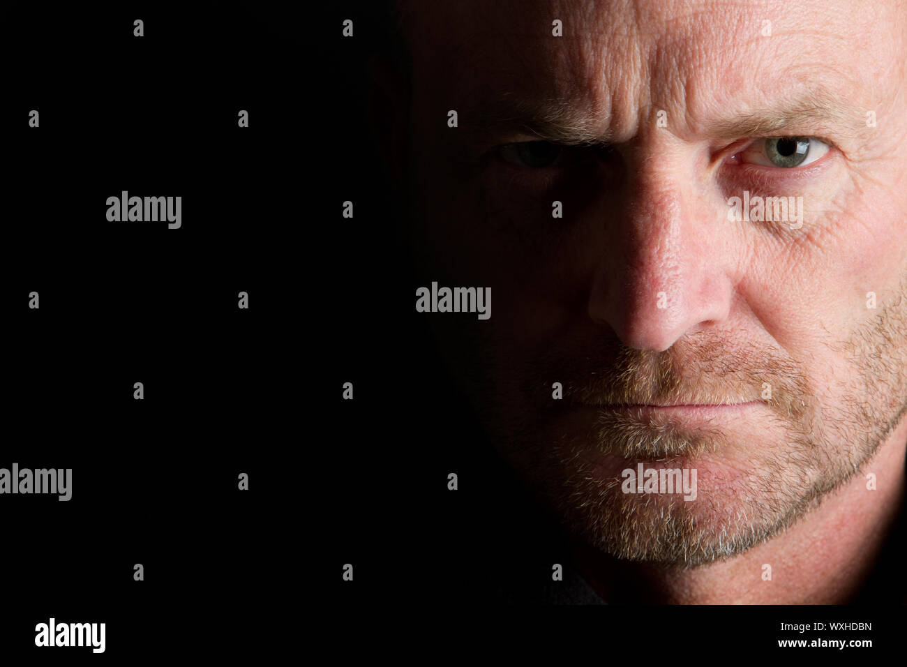 Low key portrait sinister man hi-res stock photography and images - Alamy