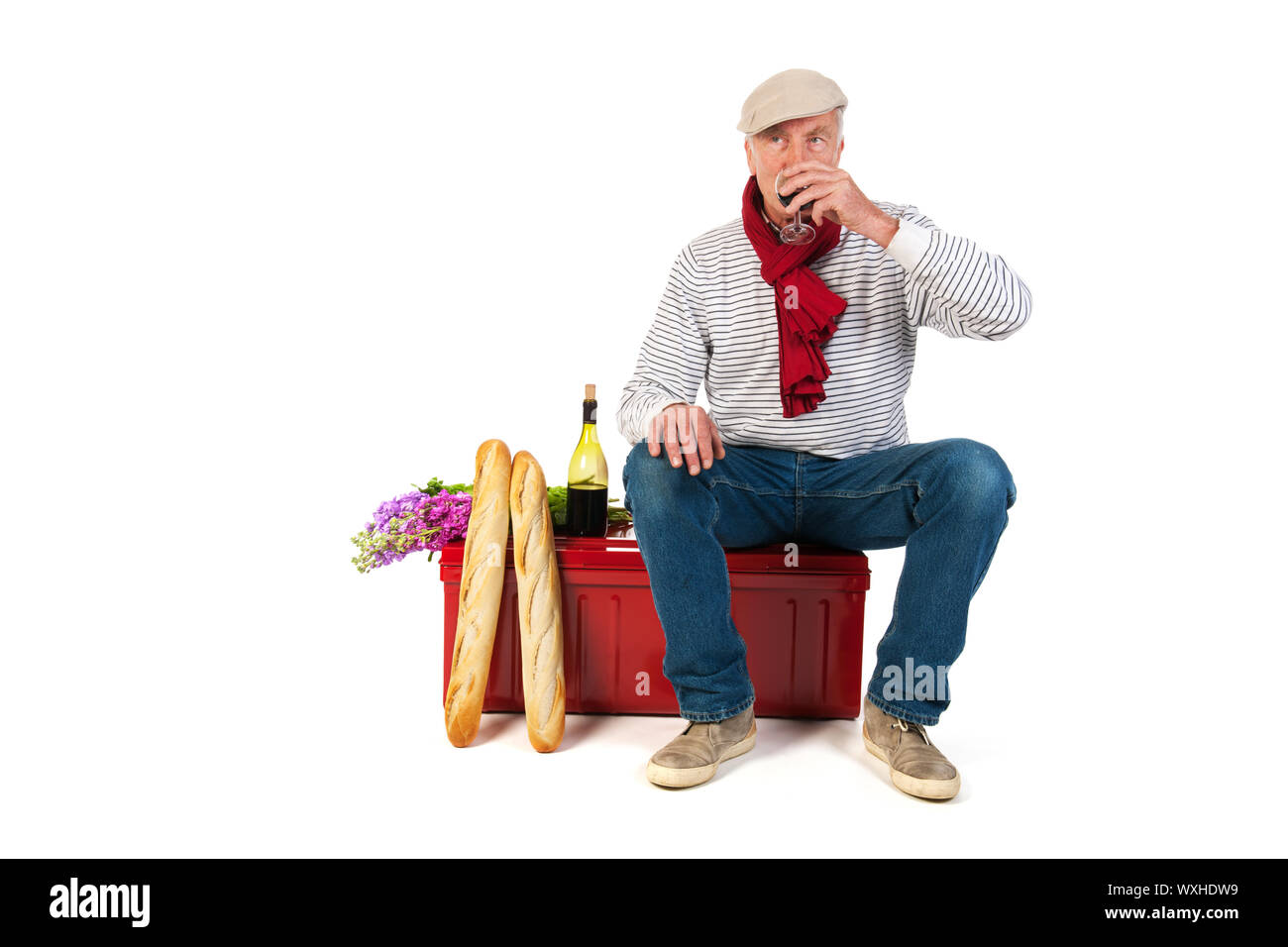 Typical French man with bread and wine isolated over white background ...