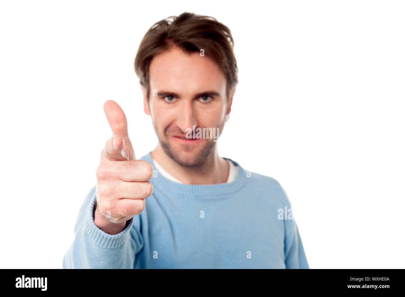 Smart man pointing towards the camera Stock Photo - Alamy