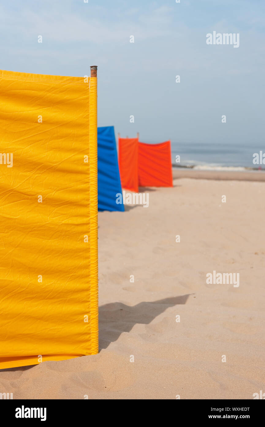 Beach with colorful wind shields in Holand Stock Photo - Alamy