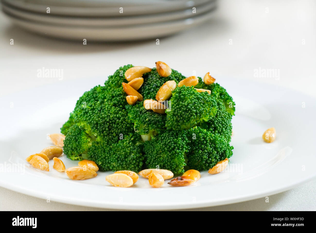 fresh and vivid sauteed broccoli and almonds very ealthy food Stock ...