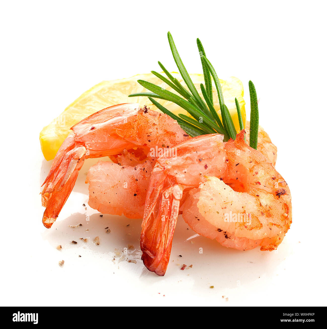 Roasted tails of shrimps with fresh rosemary and lemon Stock Photo - Alamy