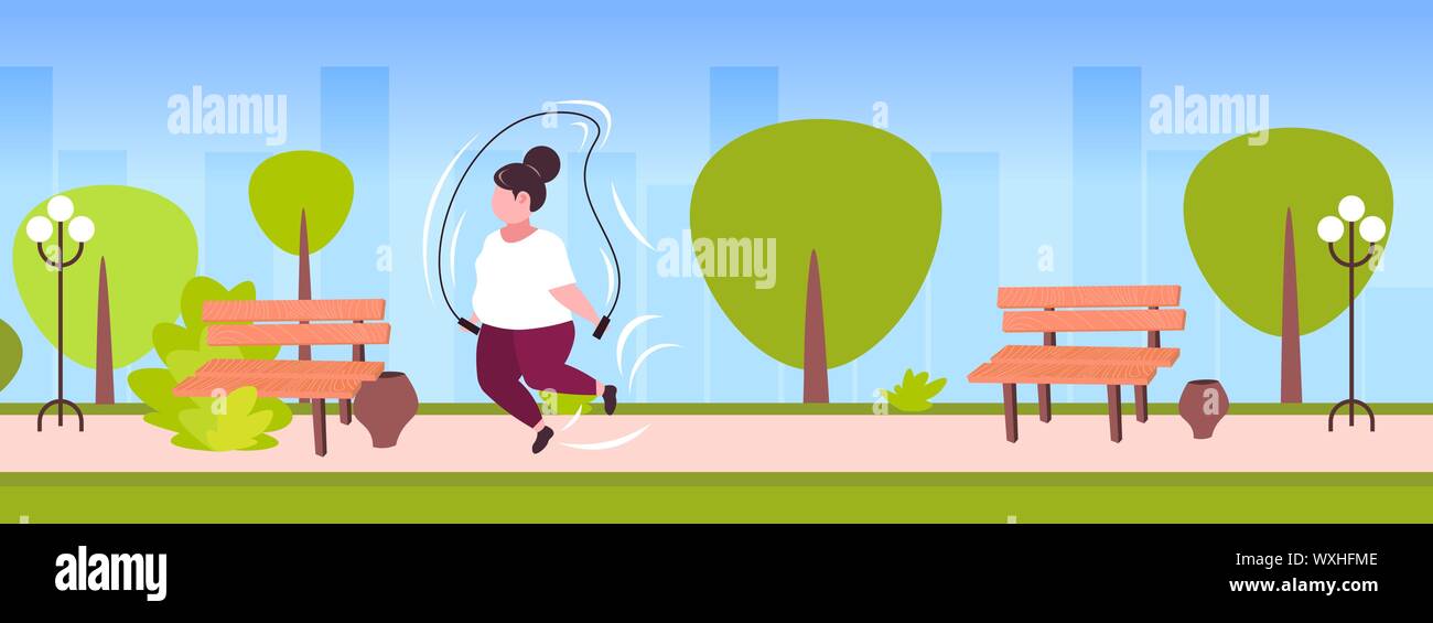 fat obese woman doing exercises with jumping rope overweight girl ...