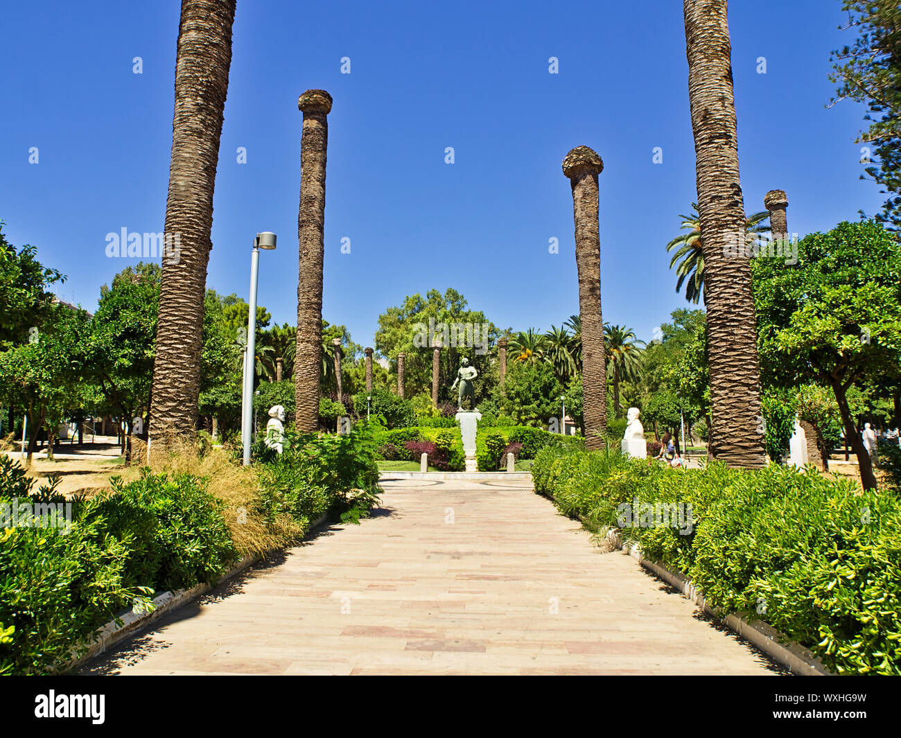 Paved pedestrian road in municipal garden in Chios island, Greece Stock ...