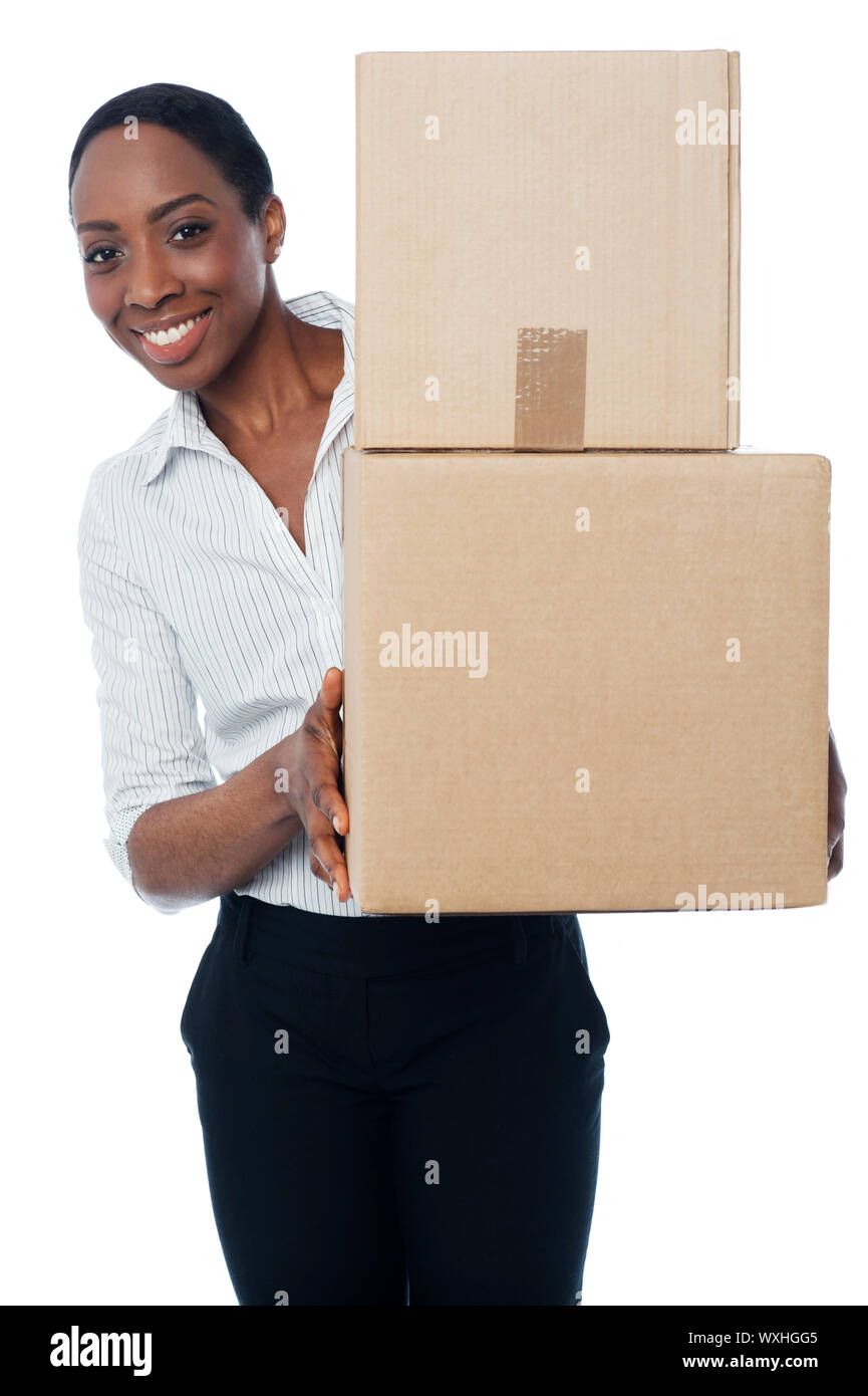 Business lady carrying cartons Stock Photo - Alamy