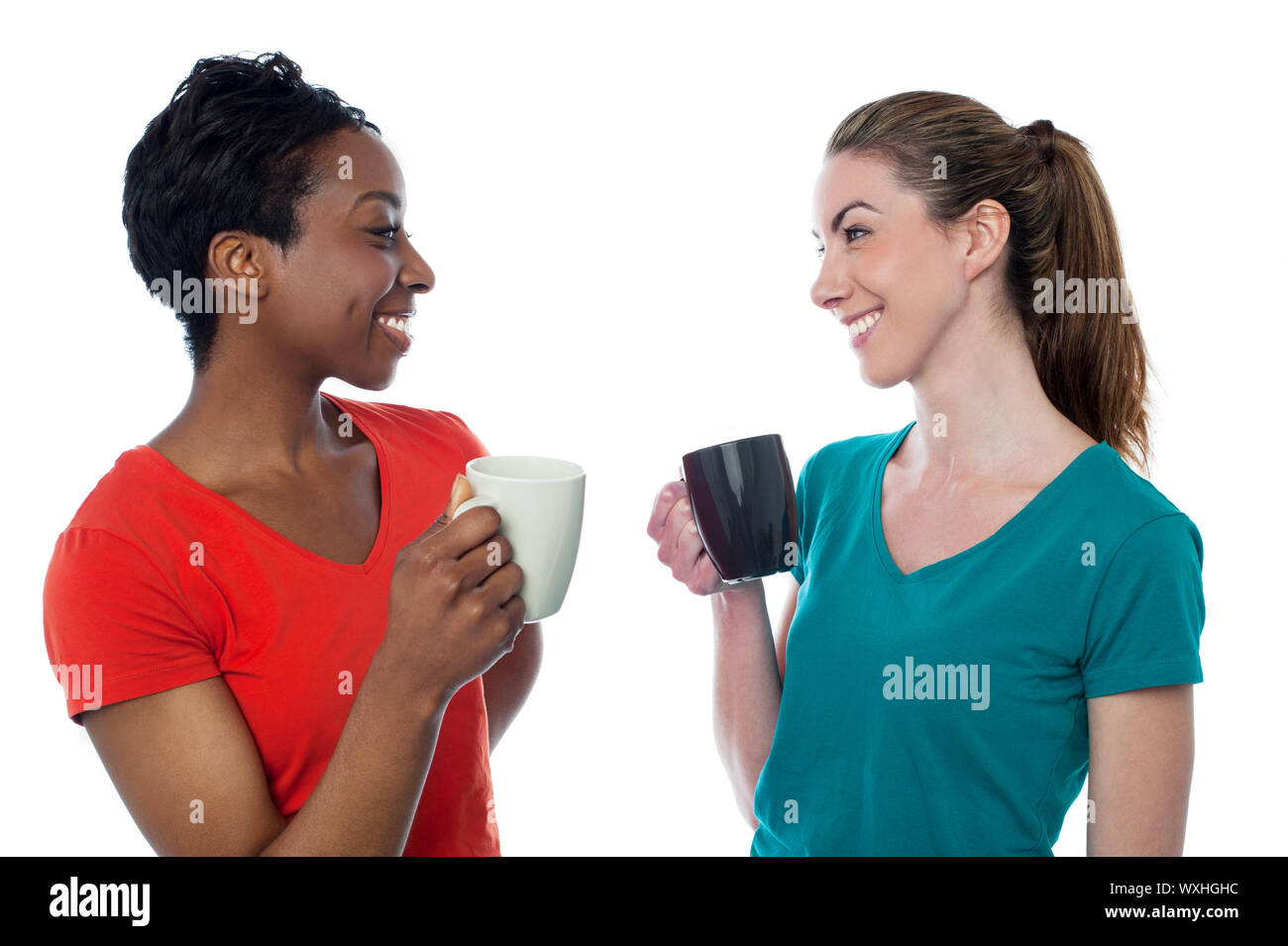 Two charming friends enjoying coffee Stock Photo - Alamy
