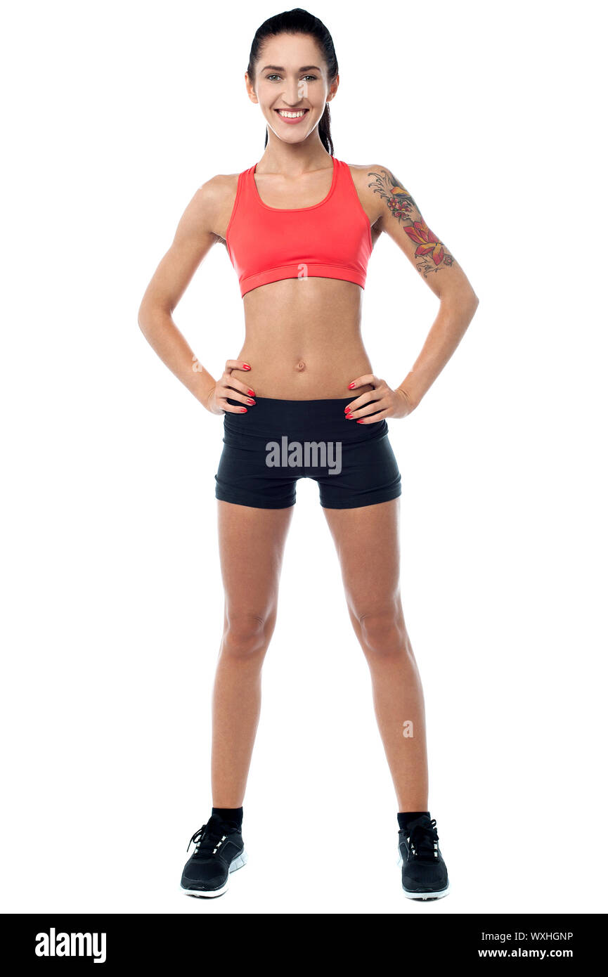 Fitness girl posing in trendy gym wear Stock Photo - Alamy